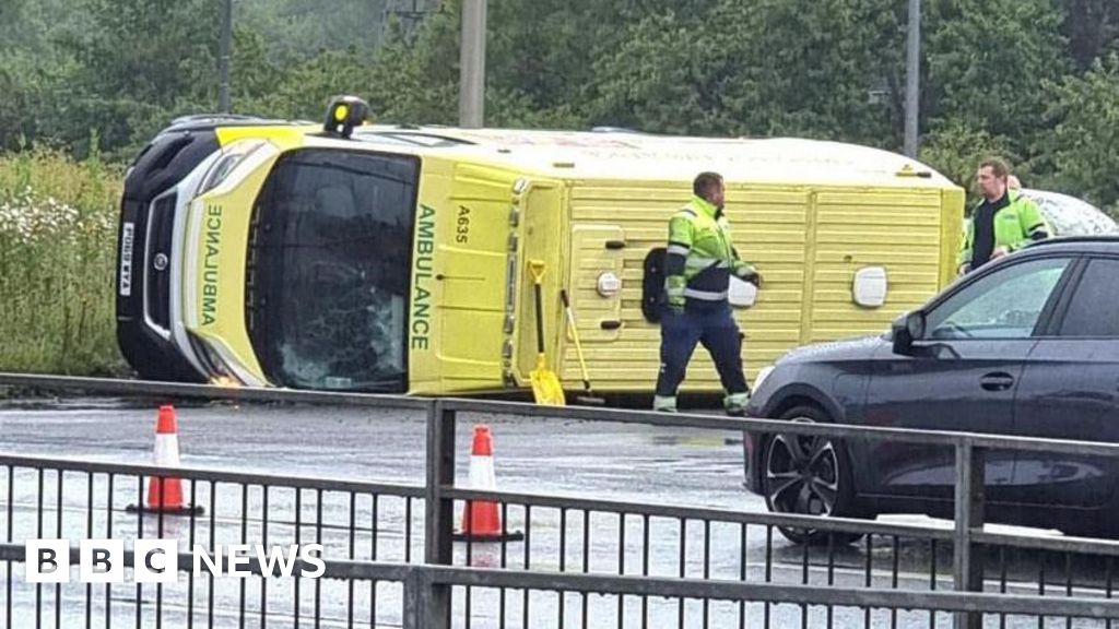 North West ambulance on 999 call overturns in crash with taxi - BBC News