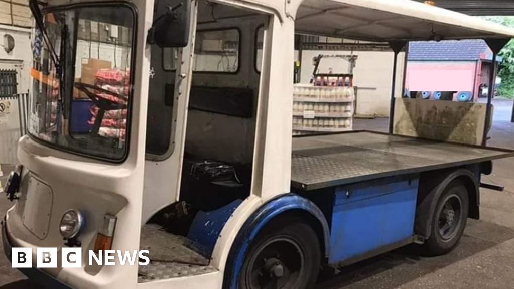 Wombourne thieves drive off with milk float on lorry - BBC News