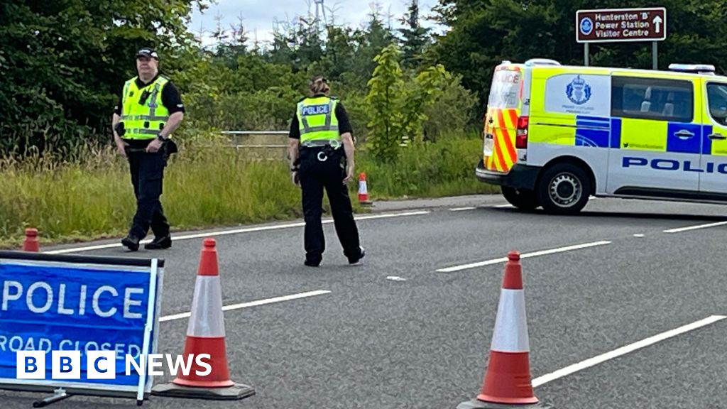 Bus tips over and crashes on country road near Largs - BBC News