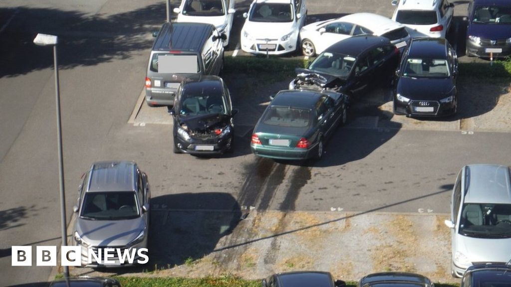 German driver smashes into 14 parked cars - BBC News