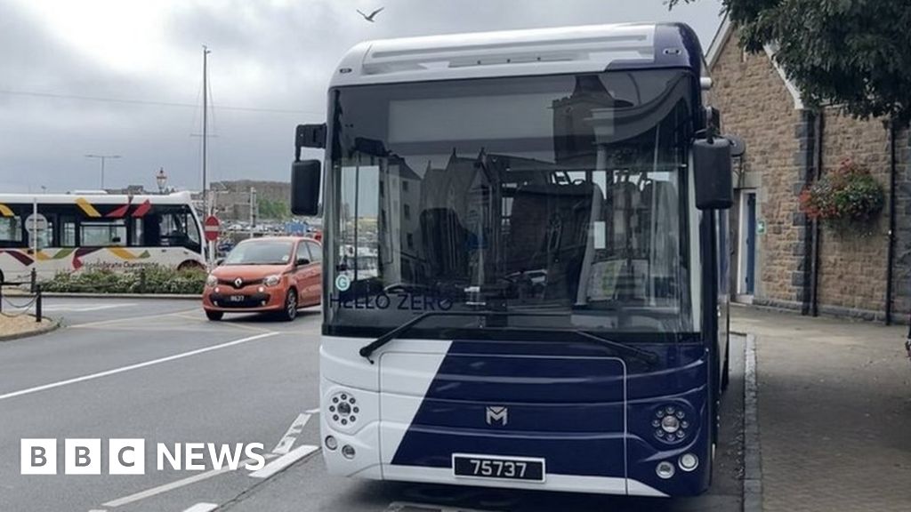 Passengers trialling electric bus in Guernsey - BBC News