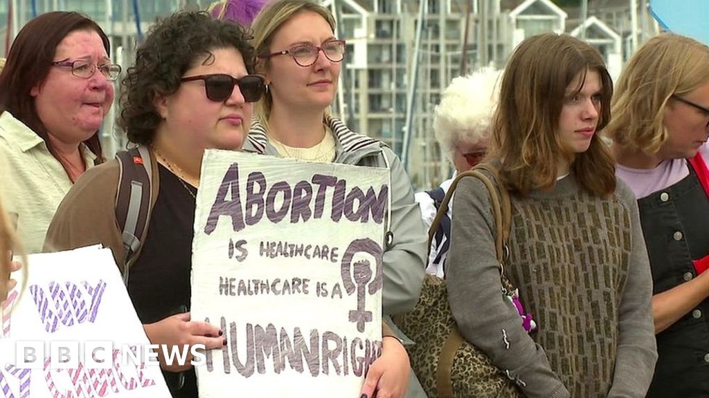 US abortion: Protest march held in Plymouth after decision - BBC News