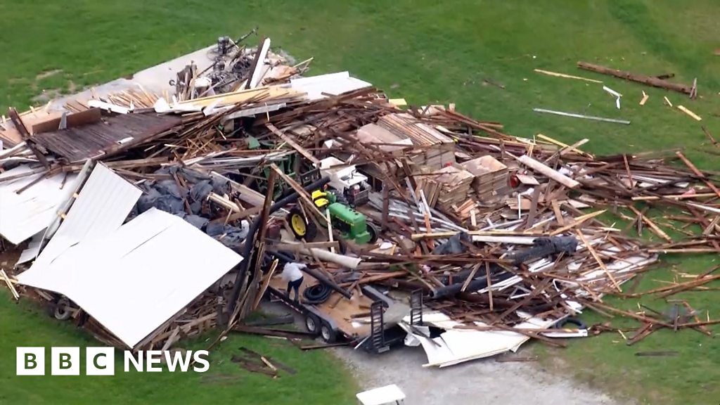 Roofs blown away and trees uprooted by US storms