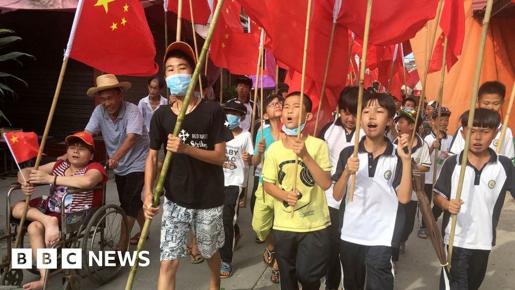 Wukan, China: Villagers rally behind chief after 'confession' - BBC News