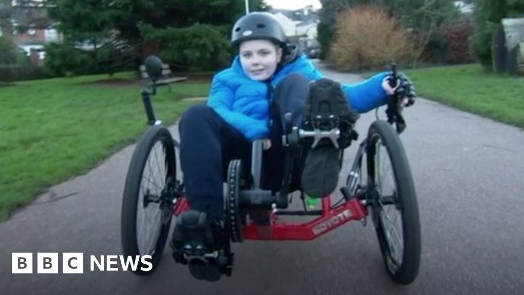 Exeter brain injury boy's trike means freedom - BBC News