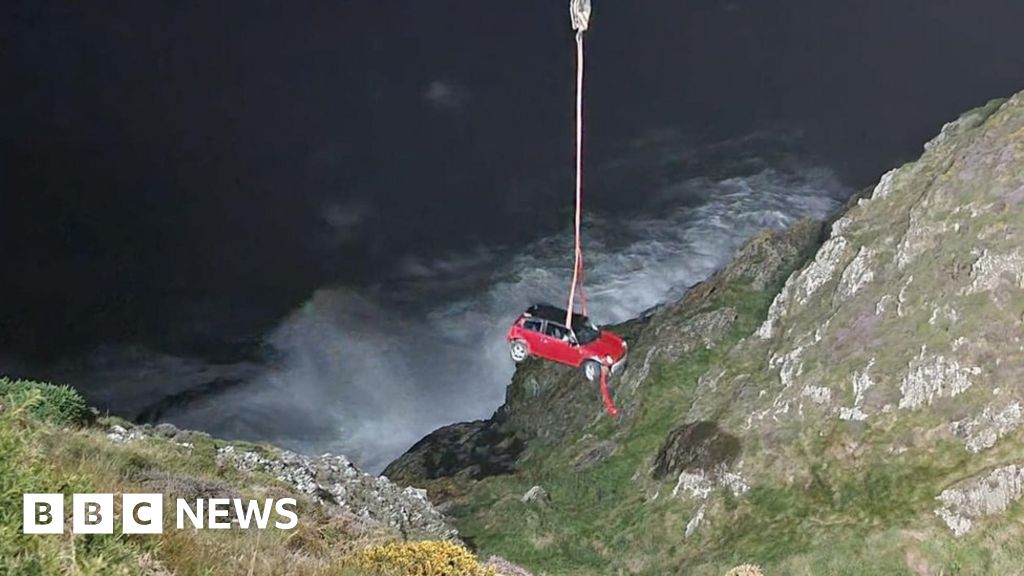 Woman rescued after car plunges off Isle of Man cliff