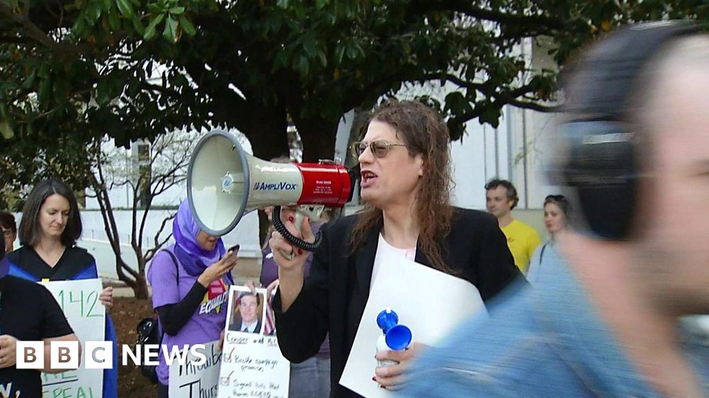 'Air horn orchestra' protest for transgender rights - BBC News