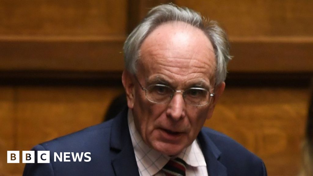 Peter Bone: Man charged over malicious calls to Tory MP - BBC News