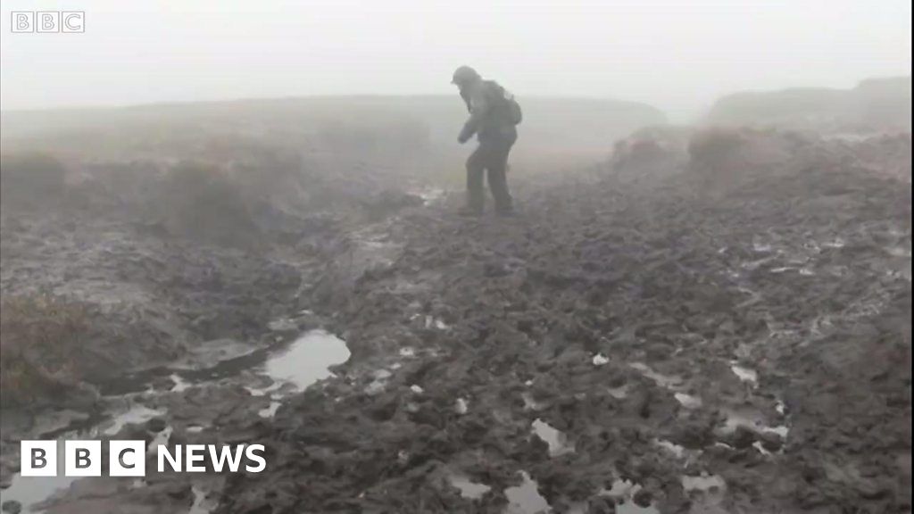 Coast 2 Coast: Slabs laid after people get stuck in mud - BBC News
