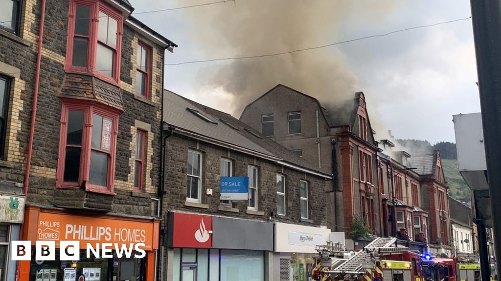 Tonypandy fire: Crews battle blaze across four premises - BBC News