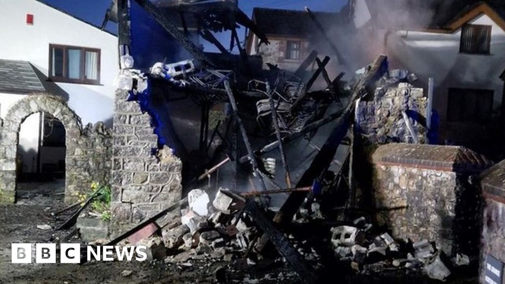 Swansea: Two in hospital after fire at Horton garage - BBC News