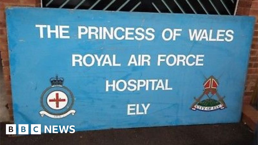 RAF cadets chip in to bring lost Ely hospital sign back - BBC News