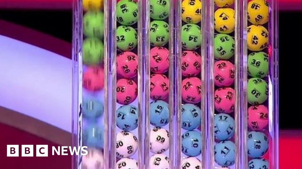 Record jackpot sparks National Lottery fever - BBC News