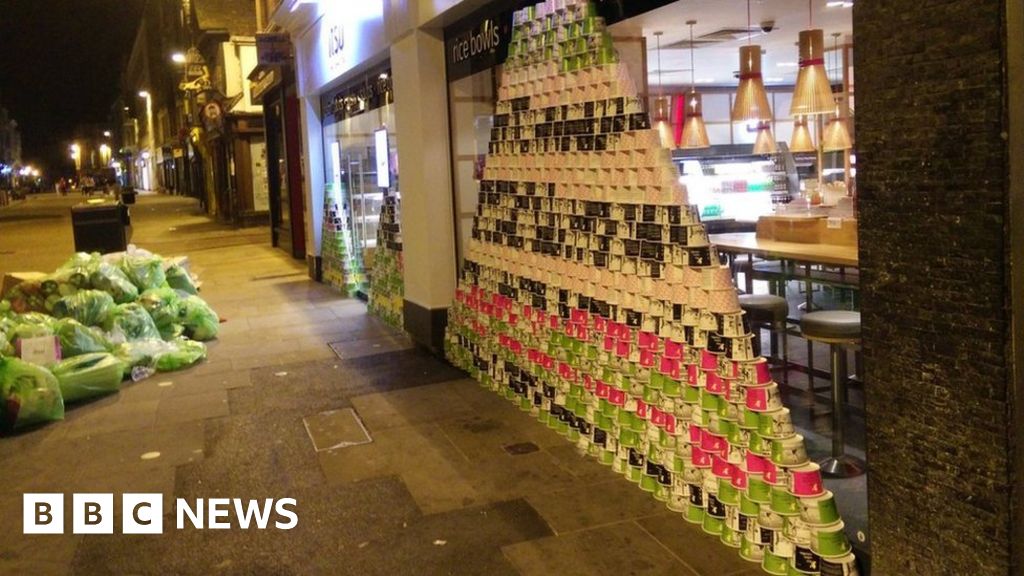 Artist's paper cup pyramid highlights waste problem