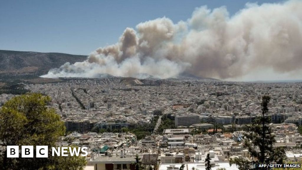 Fires rip through Athens suburb and southern peninsula - BBC News