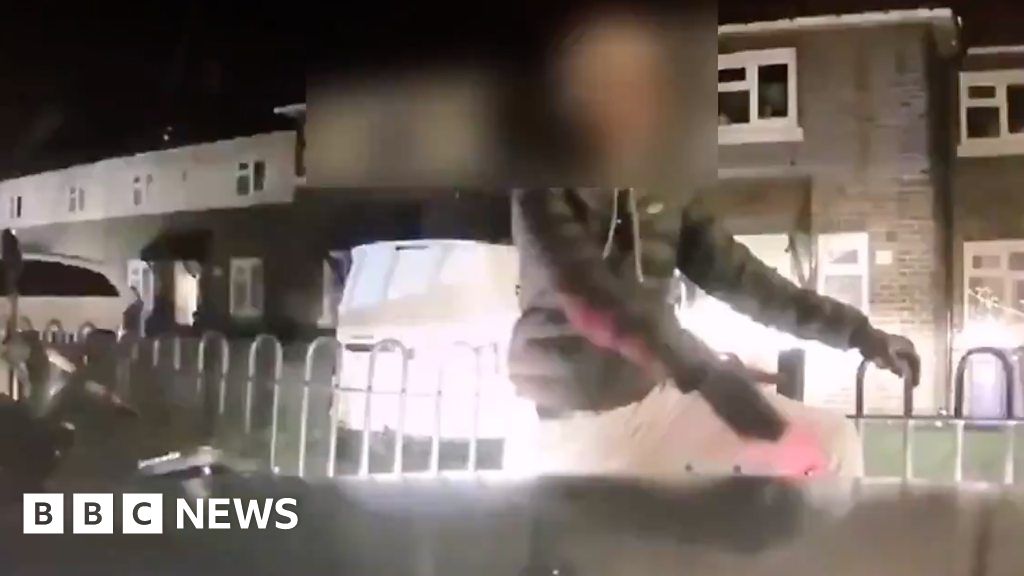 Dashcam footage shows police car pin suspect to railing