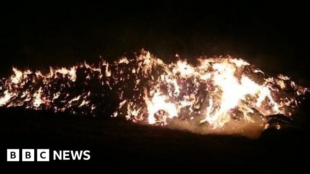 Hanwell straw bale stack destroyed by blaze - BBC News