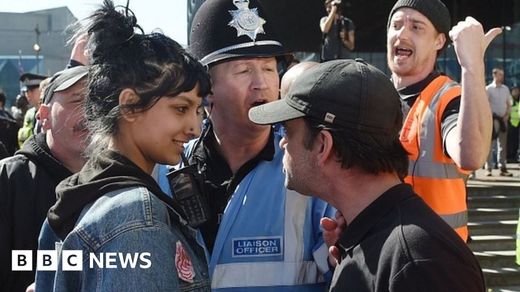 EDL Birmingham protest photo woman 'surprised' by viral reaction - BBC News
