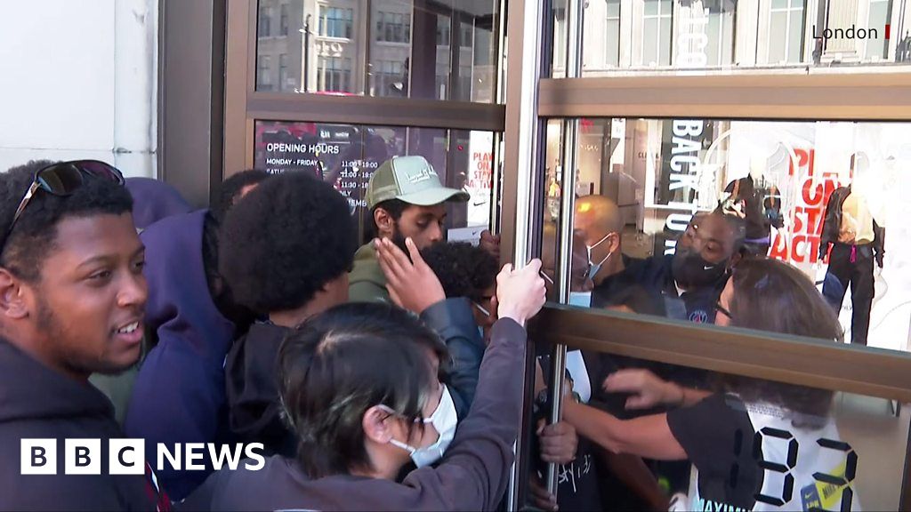 Coronavirus: Long queues as shops reopen in UK - BBC News