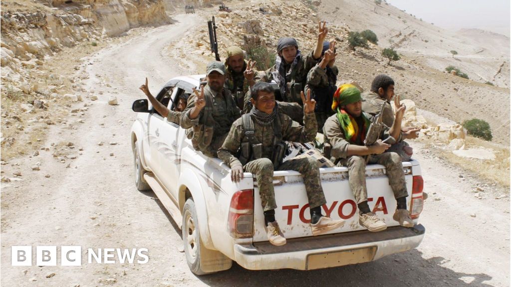 Turkey's Erdogan denounces US support for Syrian Kurds - BBC News