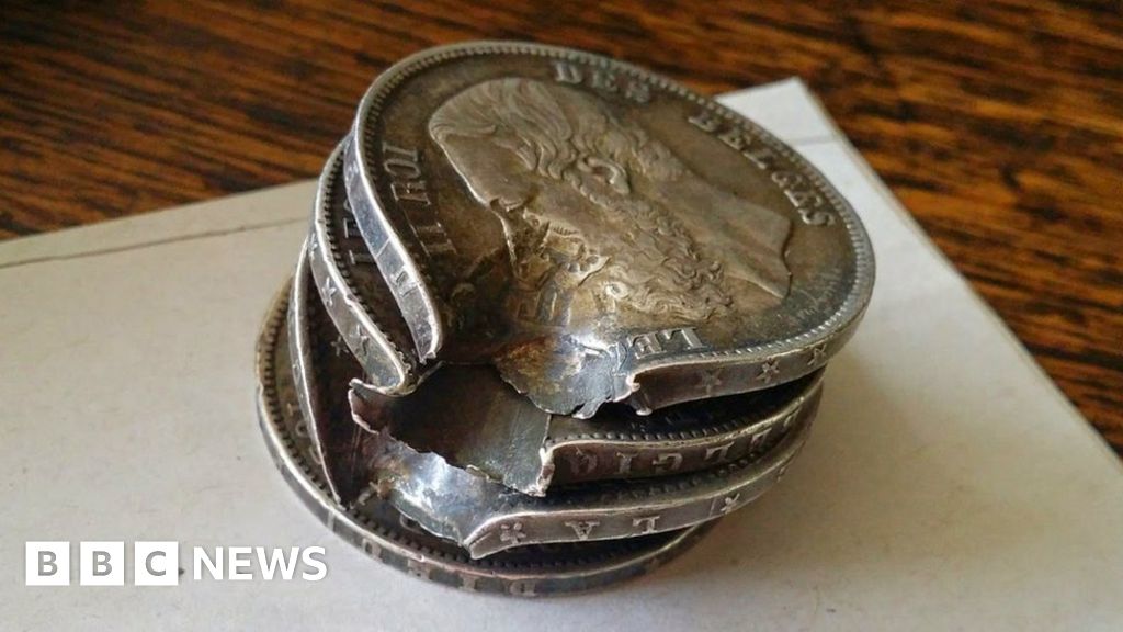 These coins stopped a bullet and saved a soldier's life - BBC News
