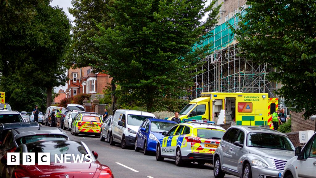 Workman killed in Eastbourne by 'falling heavy object' - BBC News