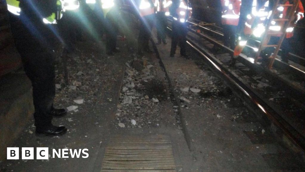 Masonry found on Tube train roof after tunnel roof damaged - BBC News
