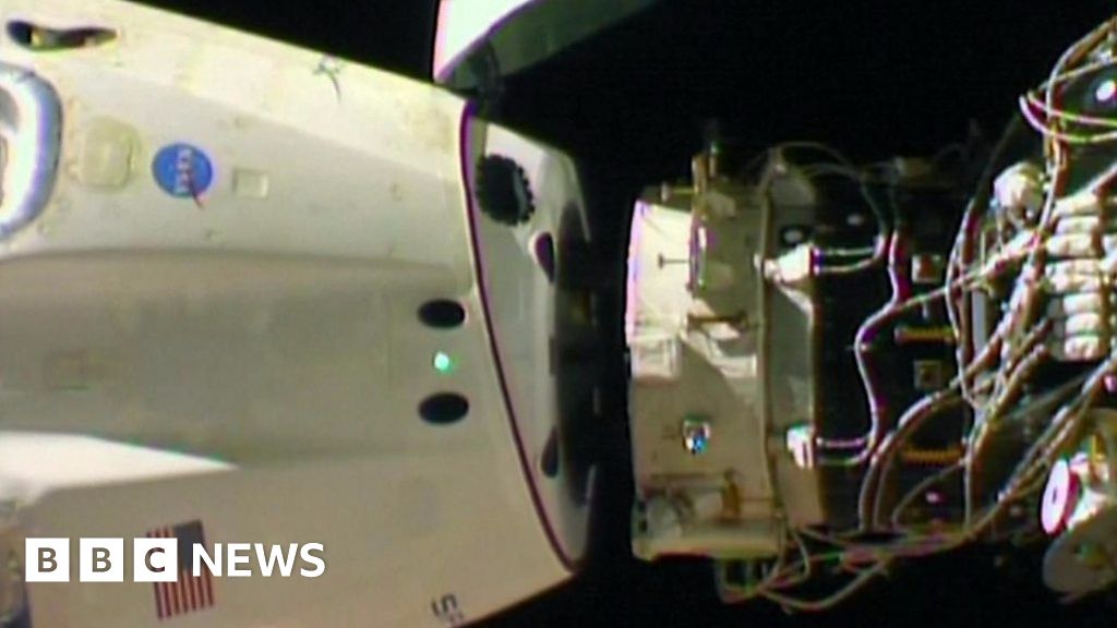 Moment SpaceX Dragon capsule undocks from ISS - BBC News
