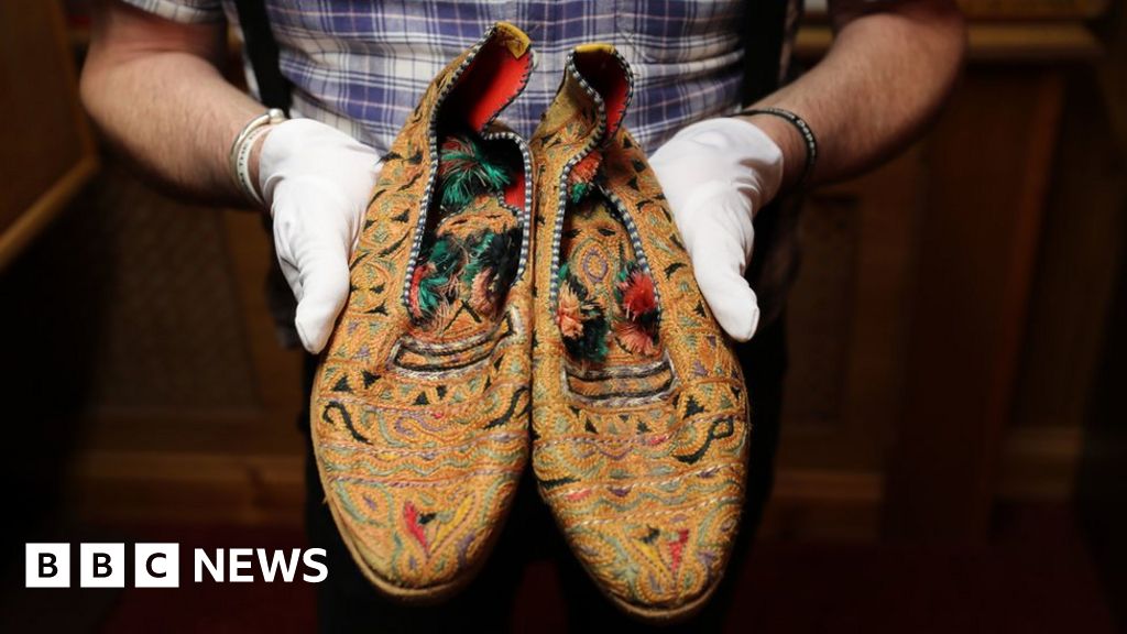 NI newspapers: Dictator's shoes on show and school absence fines - BBC News