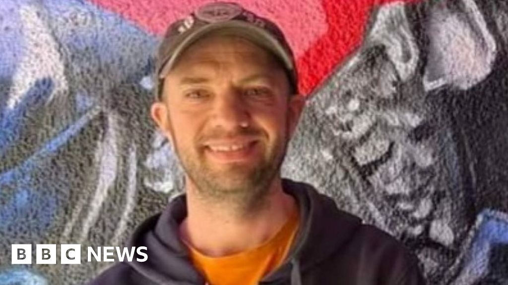 Pedestrian who died after being hit by lorry is named - BBC News