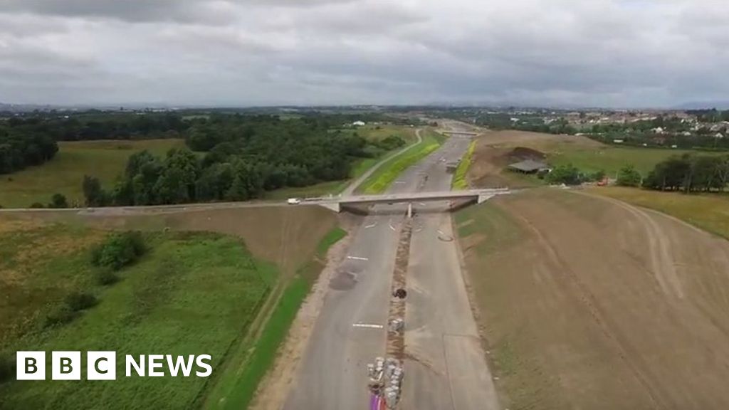 Drone footage shows scale of £500m motorway upgrade - BBC News