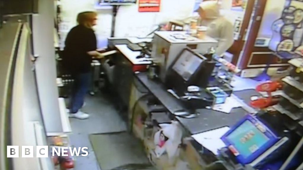Ely Post Office worker chases armed robber with baseball bat - BBC News