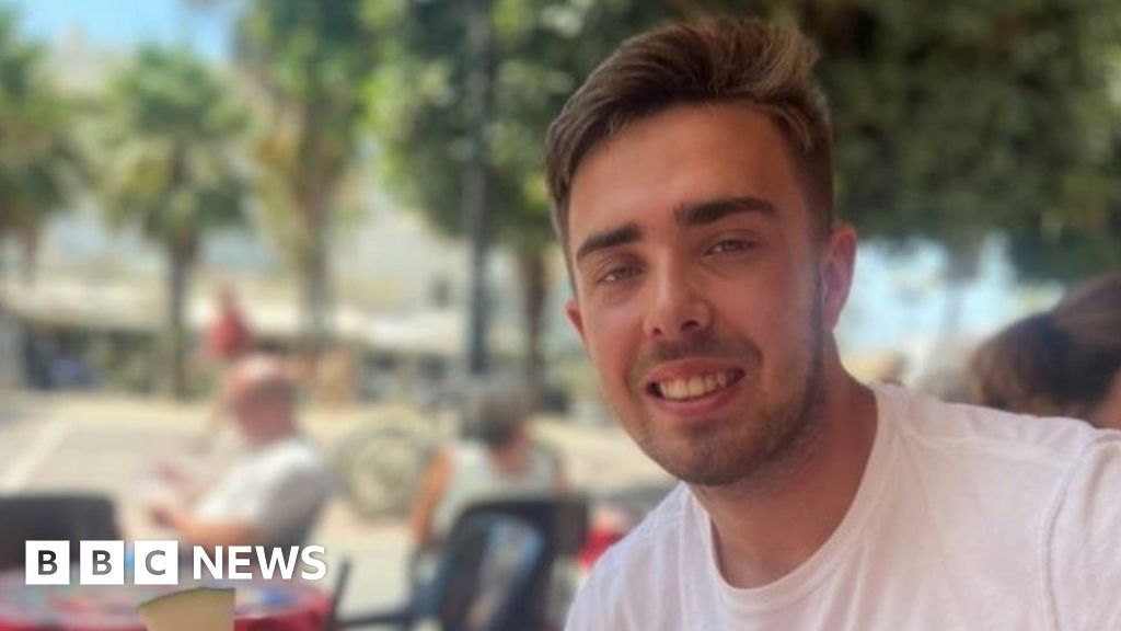 Funeral held for footballer who was struck by car - BBC News