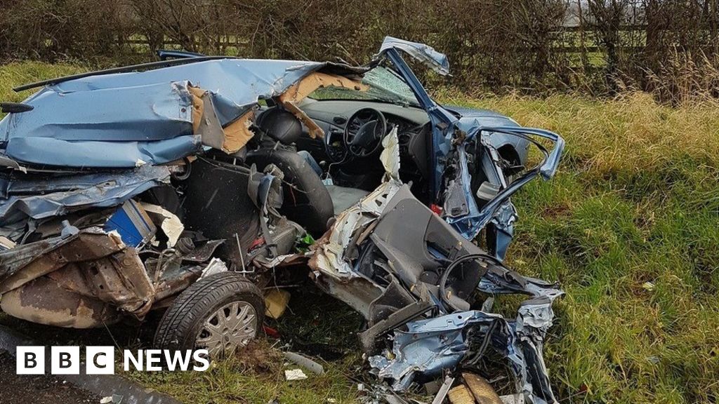 Driver's lucky escape after car crushed in crash - BBC News