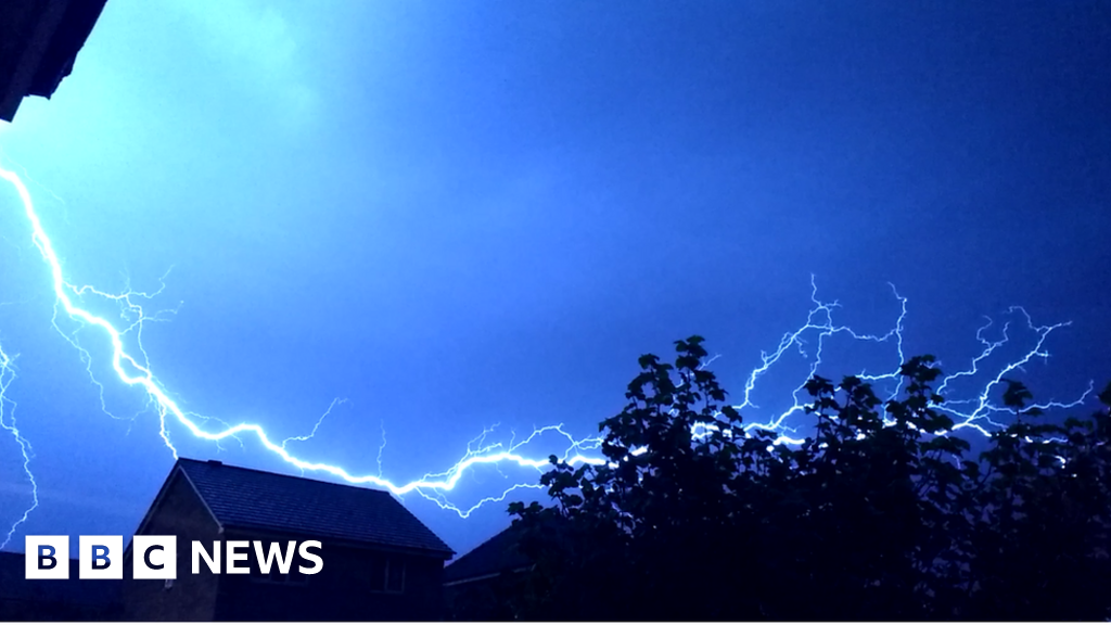 Thunder, lightning and downpours strike England - BBC News