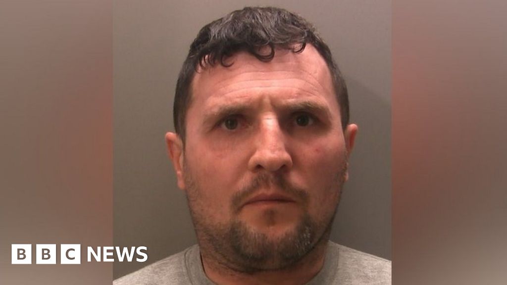 Workington killer jailed again for punching woman's helpers - BBC News