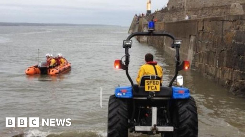 Man rescued after falling off jet ski at Porthcawl - BBC News