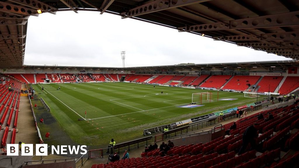 Bradford City warns fans after flares set off in away end - BBC News