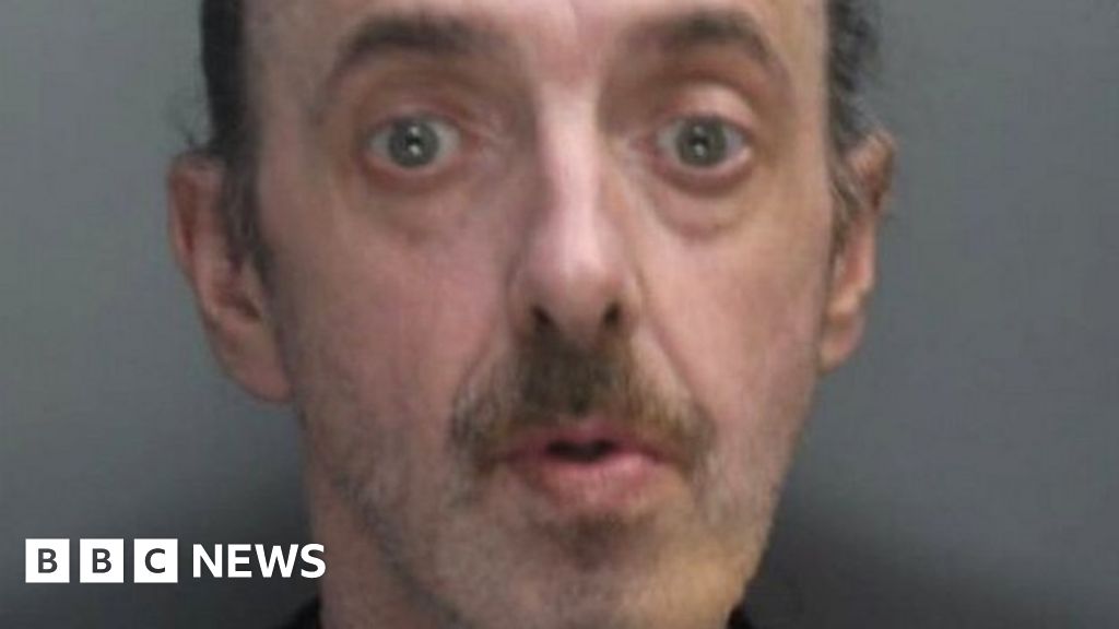 Bootle man jailed for cyber attacks on more than 300 websites - BBC News