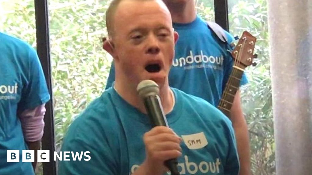 Singing makes Sam with Down's syndrome 'feel more alive' - BBC News