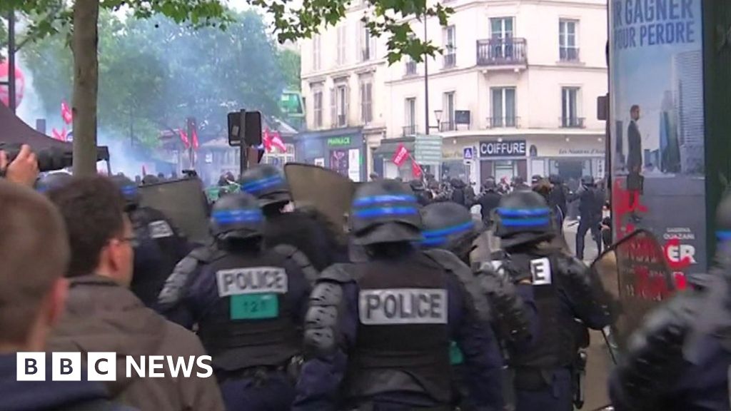 French police tear gas protesters in Paris - BBC News