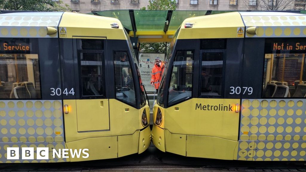 Major disruption after two Metrolink trams crash in Manchester - BBC News