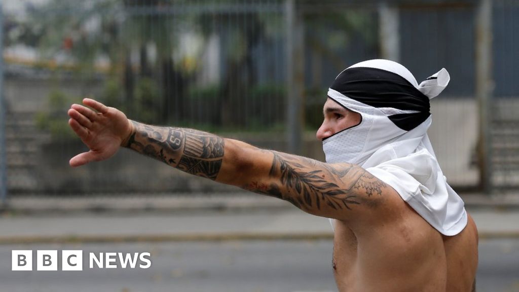 Venezuela crisis: Police fire tear gas as protests enter second day ...