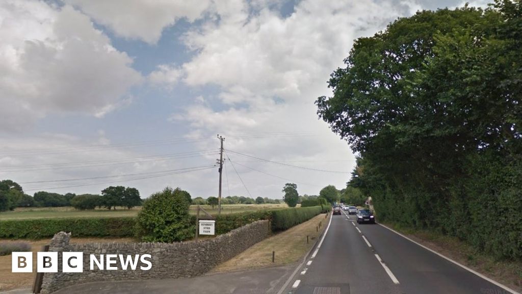 Sturminster Marshall crash: Driver charged over motorcyclist's death - BBC News