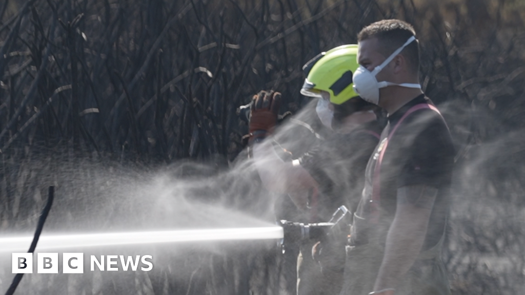 Rushmere Heath: Fire crews monitoring for hot spots - BBC News