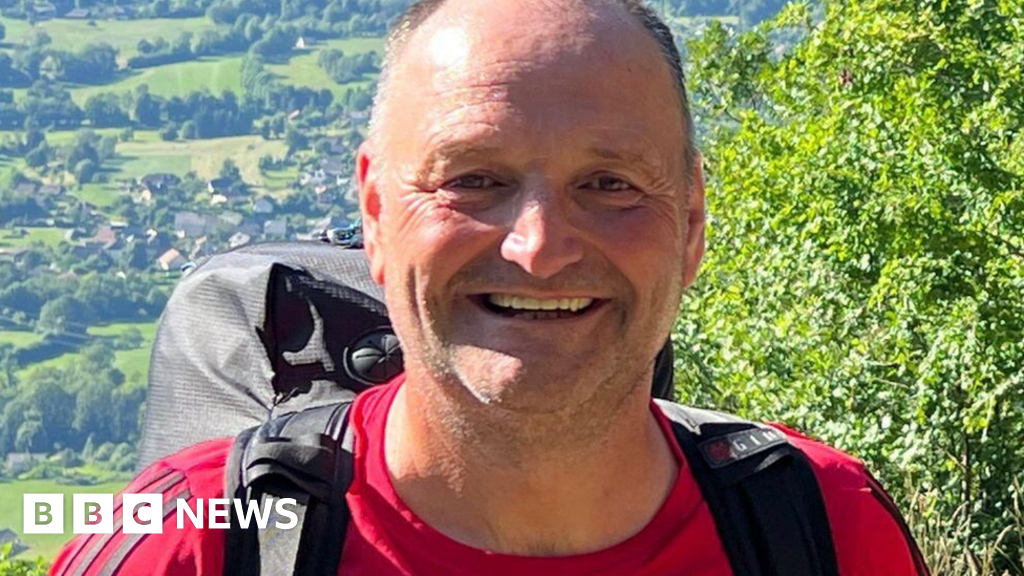 Paraglider Martin Dyer died doing what he loved, says daughter - BBC News