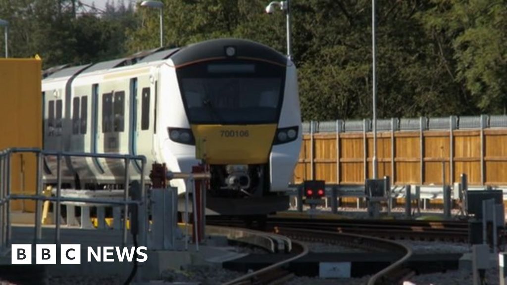 First new Thameslink train arrives at Three Bridges depot - BBC News