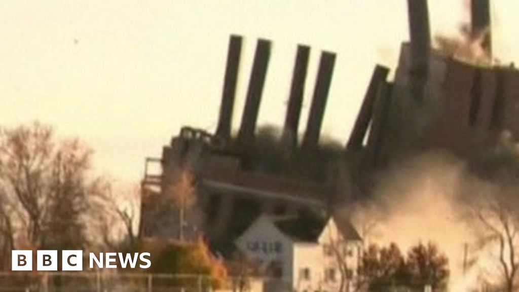 Michigan building brought down in controlled implosion - BBC News