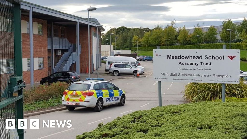Two teens arrested over assault on Meadowhead School staff - BBC News