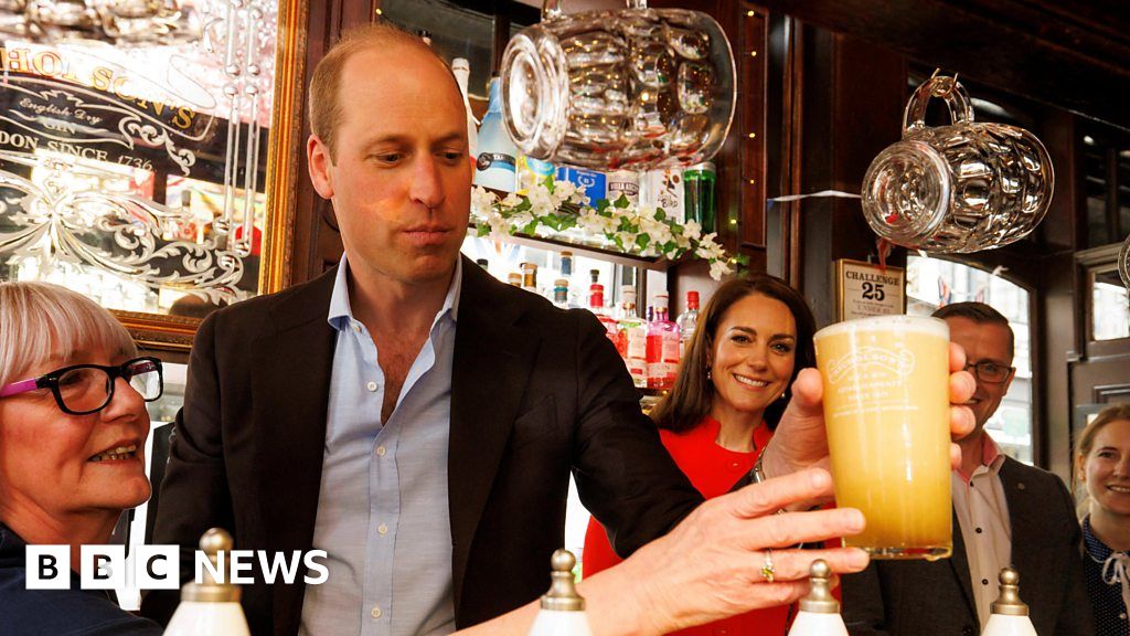 William and Kate hop on Elizabeth line to London pub and learn to pull ...